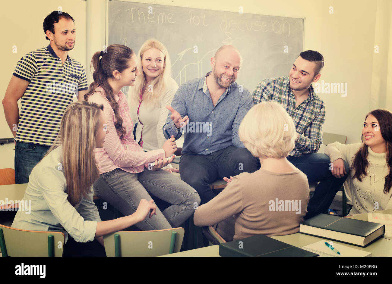 Different age students during break at extension courses Stock Photo ...