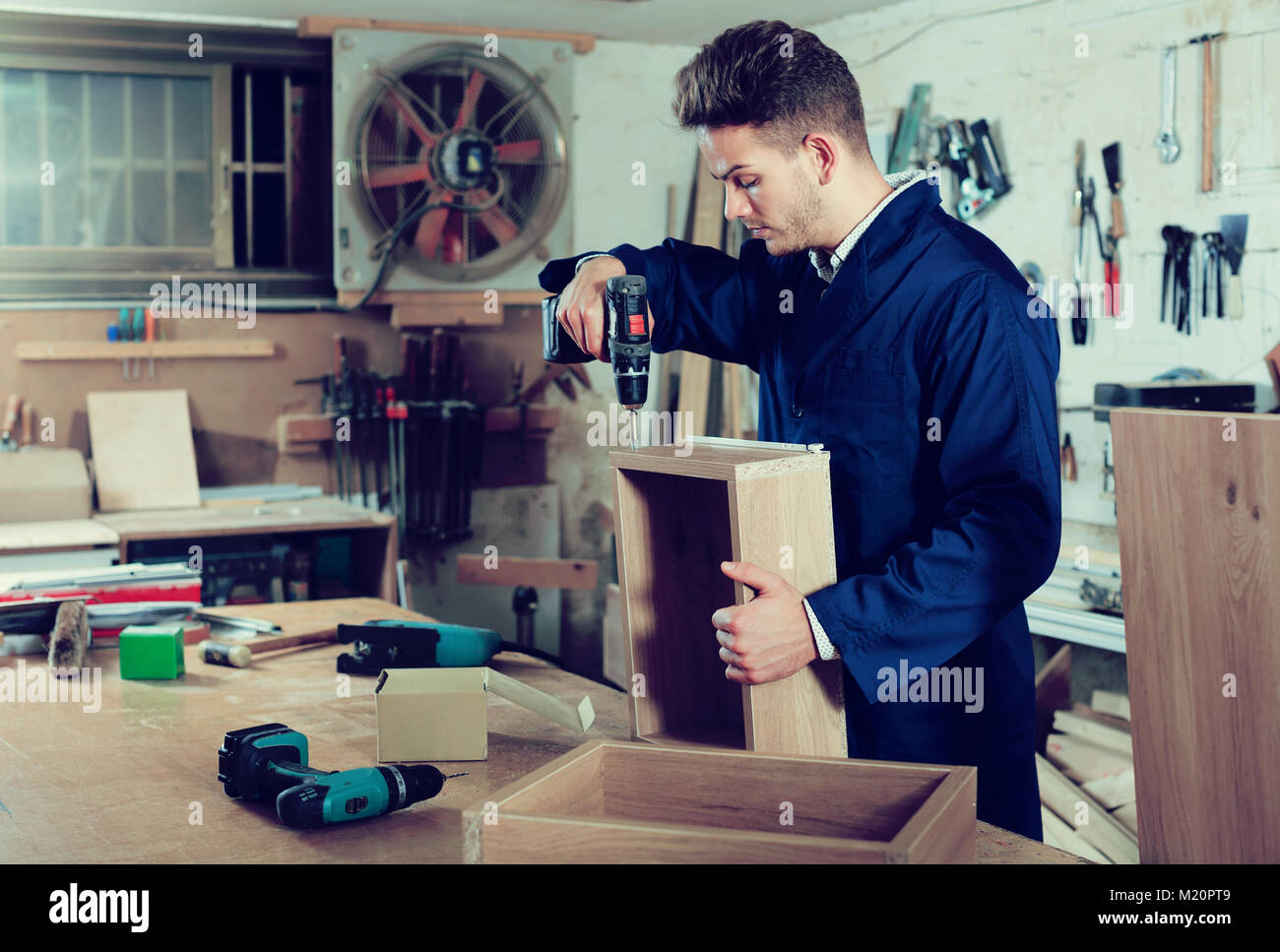 American guy using drilling hi-res stock photography and images - Alamy