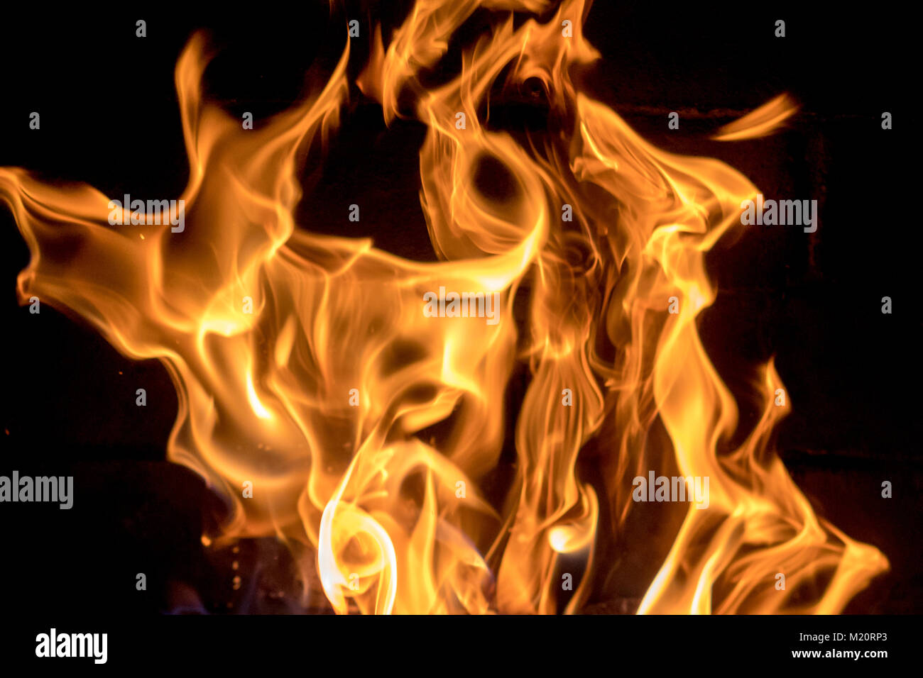 Frozen bright fire in the fireplace Stock Photo - Alamy