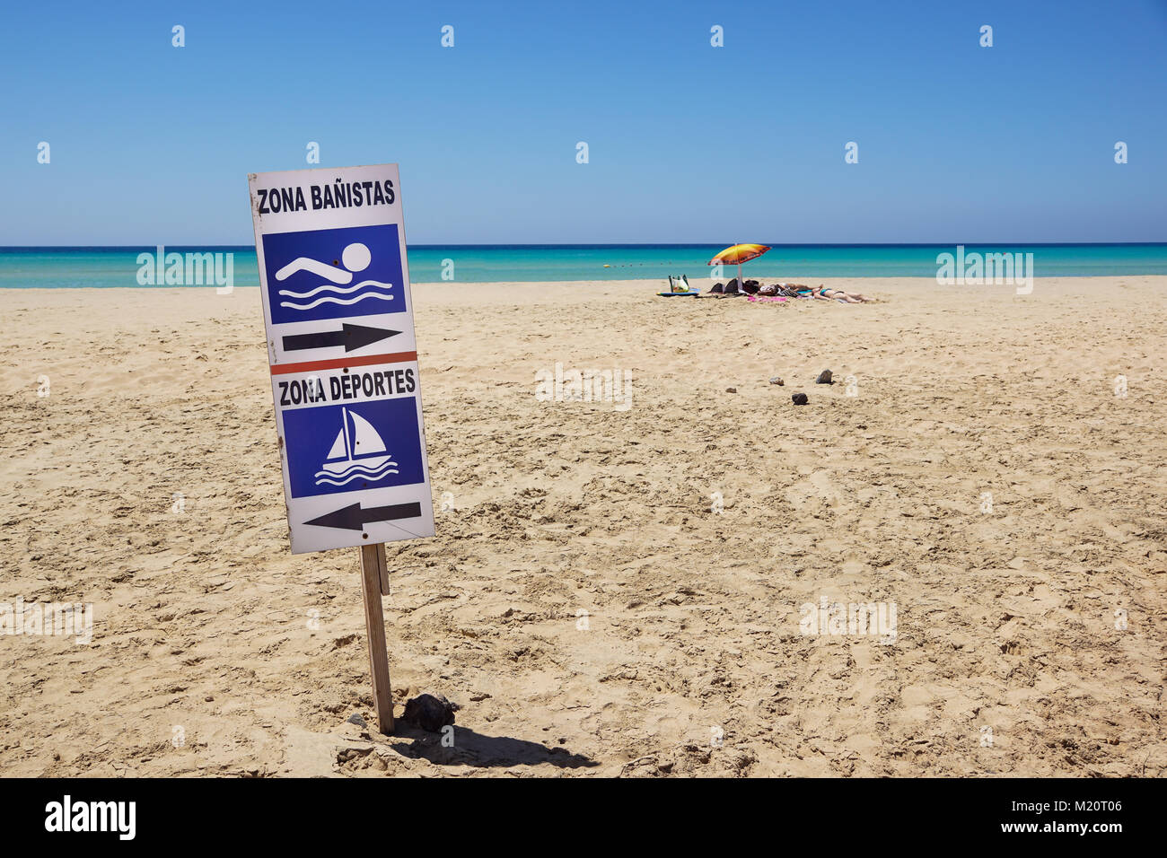 sign of bathing area on the beach for the safety of bathers compared to ...