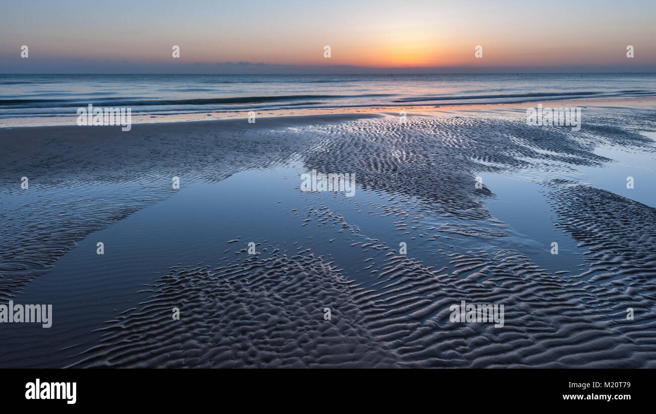 Sunrise with low clouds on Omaha Beach Normandy France in summer Stock ...