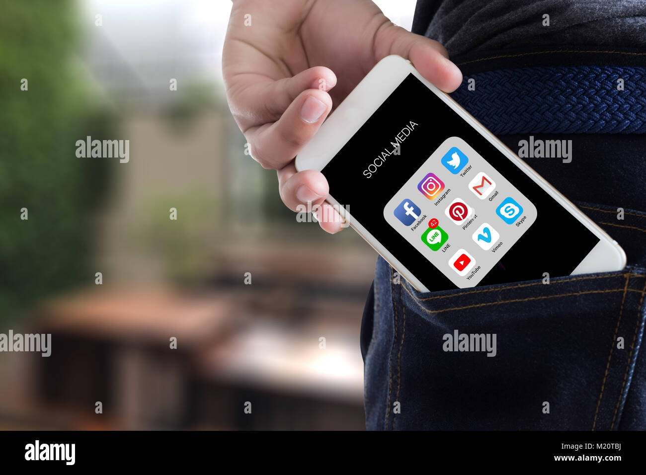 BANGKOK , THAILAND - January 27th, 2017: Hand of man using Iphone with ...