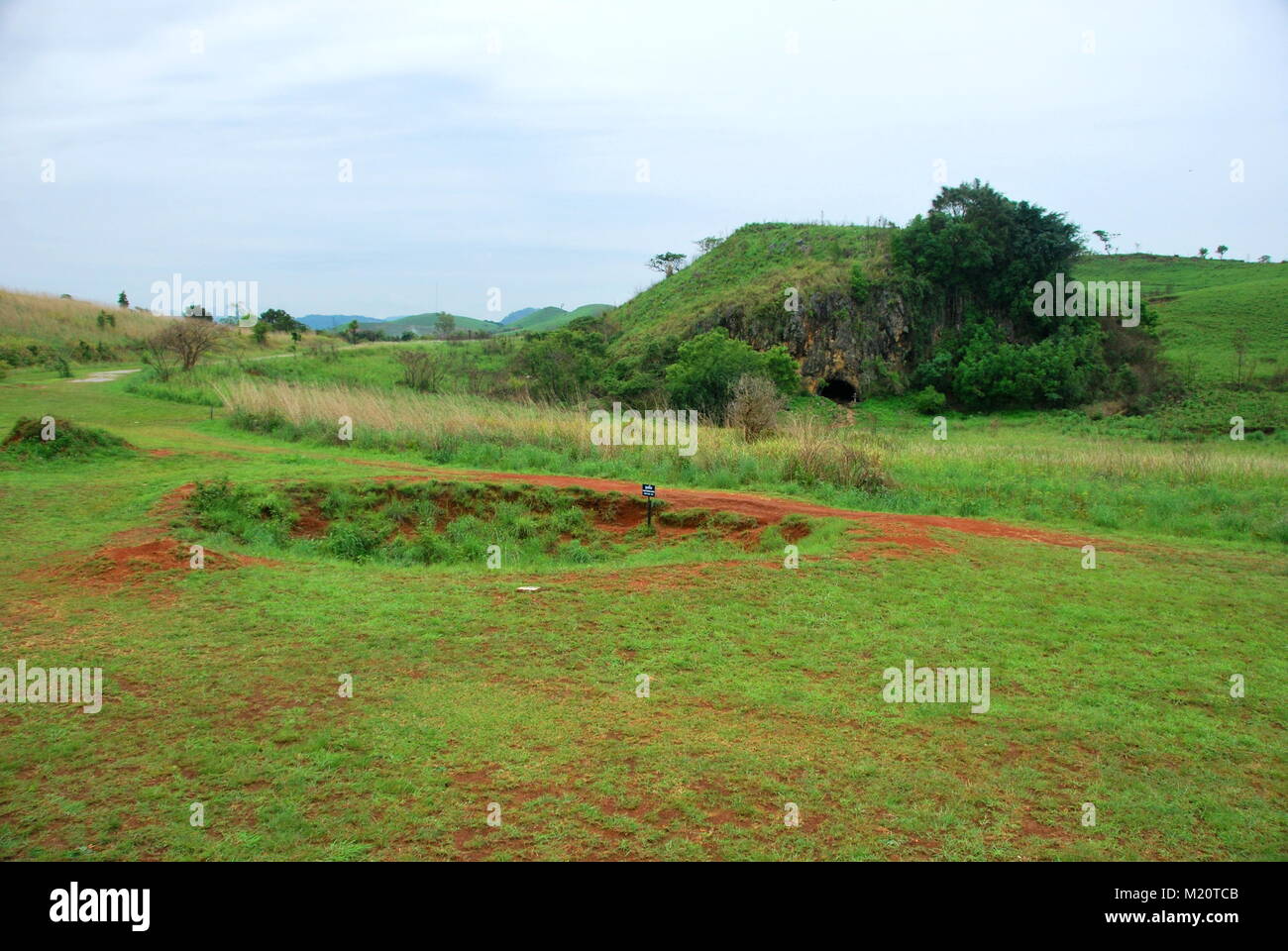 Bomb craters from the Vietnam War surround giant megalithic stone urns ...