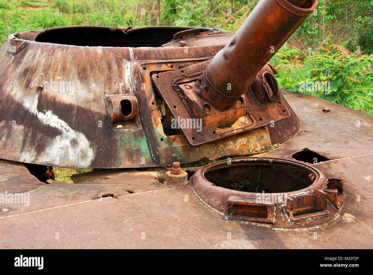 The remains of a bombed out Russian tank used by the Viet Cong in Loas ...