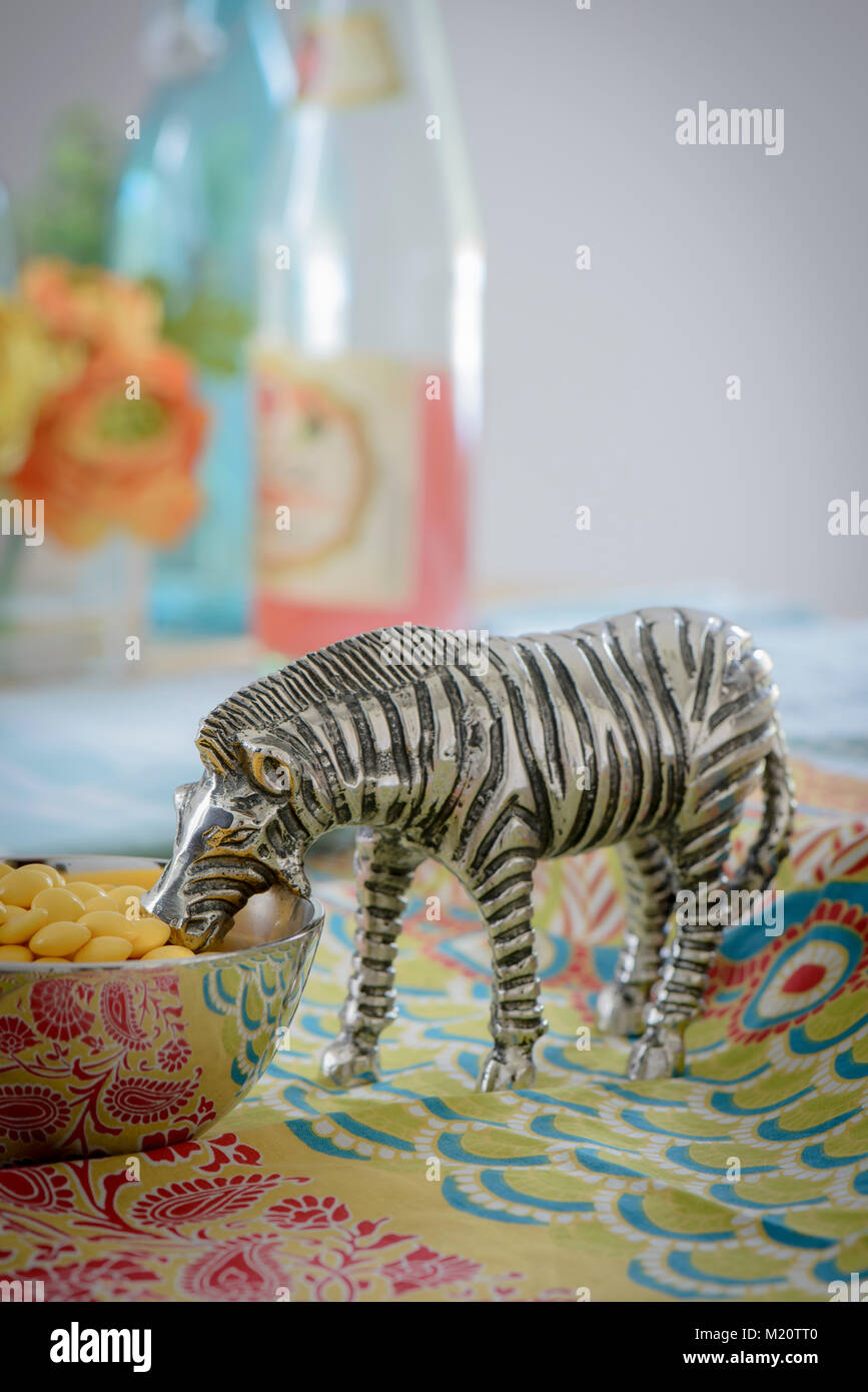 Metal food server in the shape of a zebra Stock Photo - Alamy