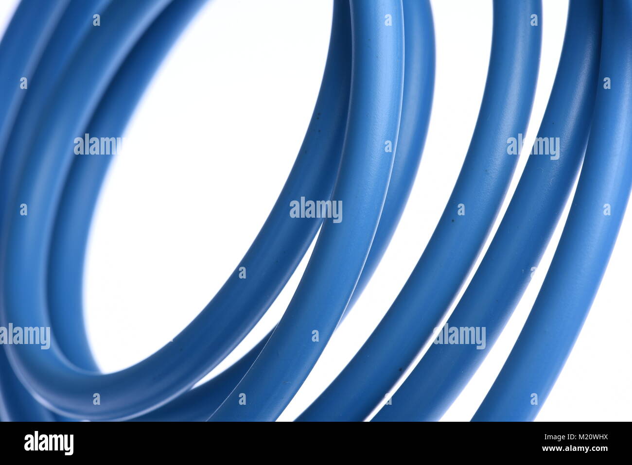 Power supply cable isolated on white background Stock Photo - Alamy