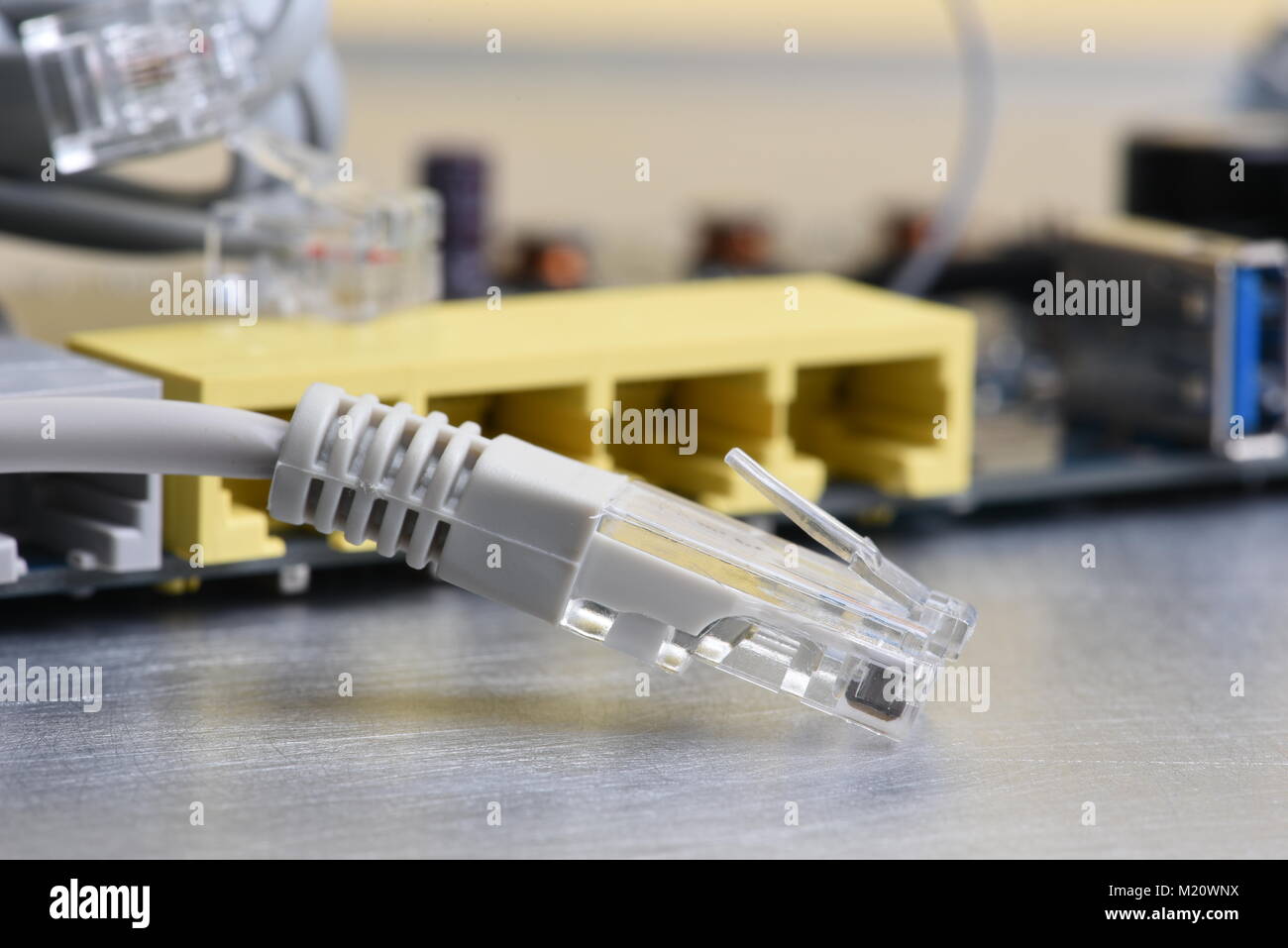 Internet router port with network patch cord closeup Stock Photo - Alamy