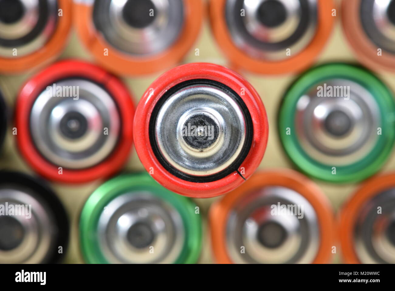 Close-up group of alkaline batteries top view Stock Photo - Alamy