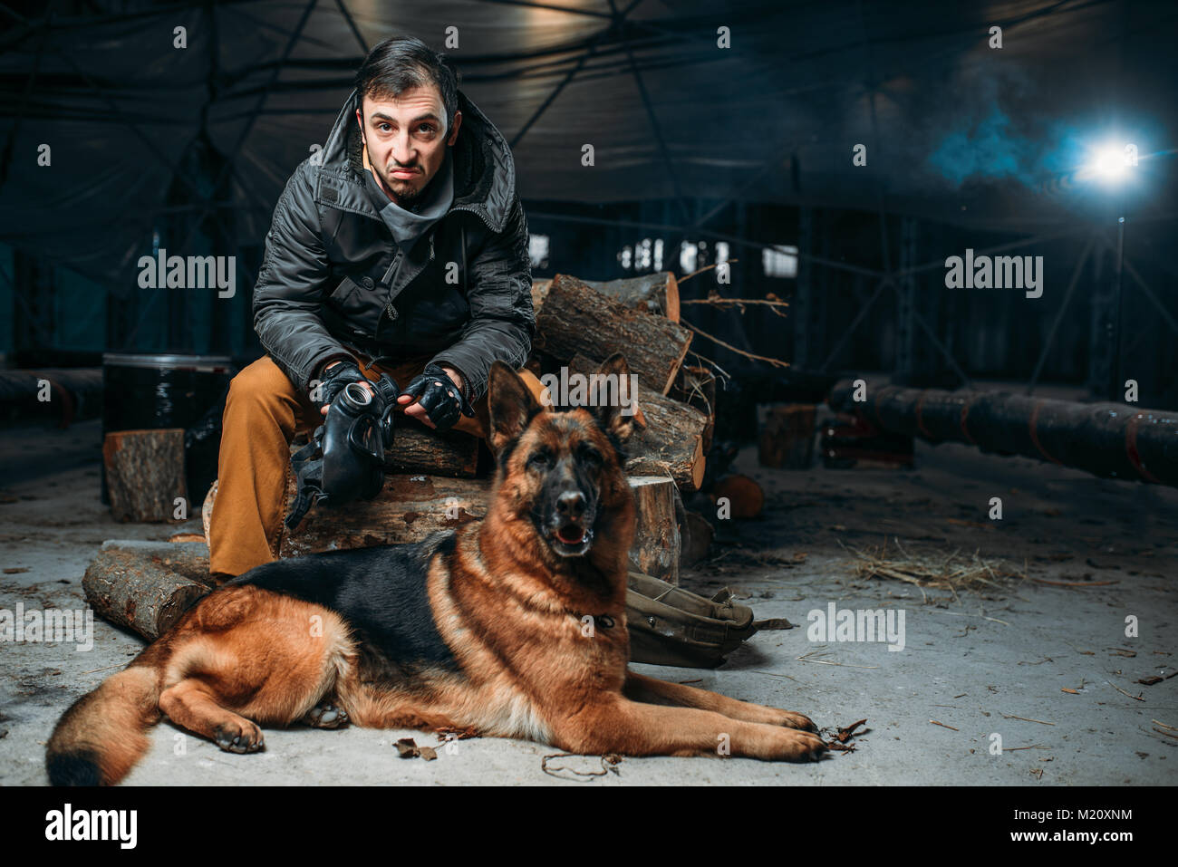 Stalker and dog, friends in post apocalyptic world. Post-apocalypse ...