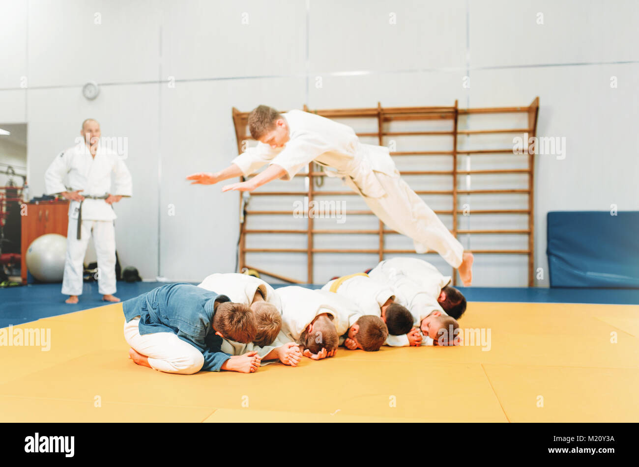 Little boys in kimono practice martial art. Kid judo, young fighters on ...
