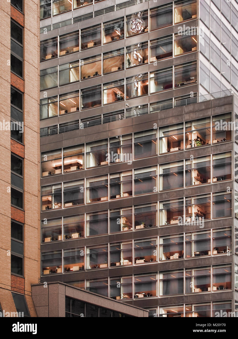 view of business offices in a skyscraper Stock Photo - Alamy