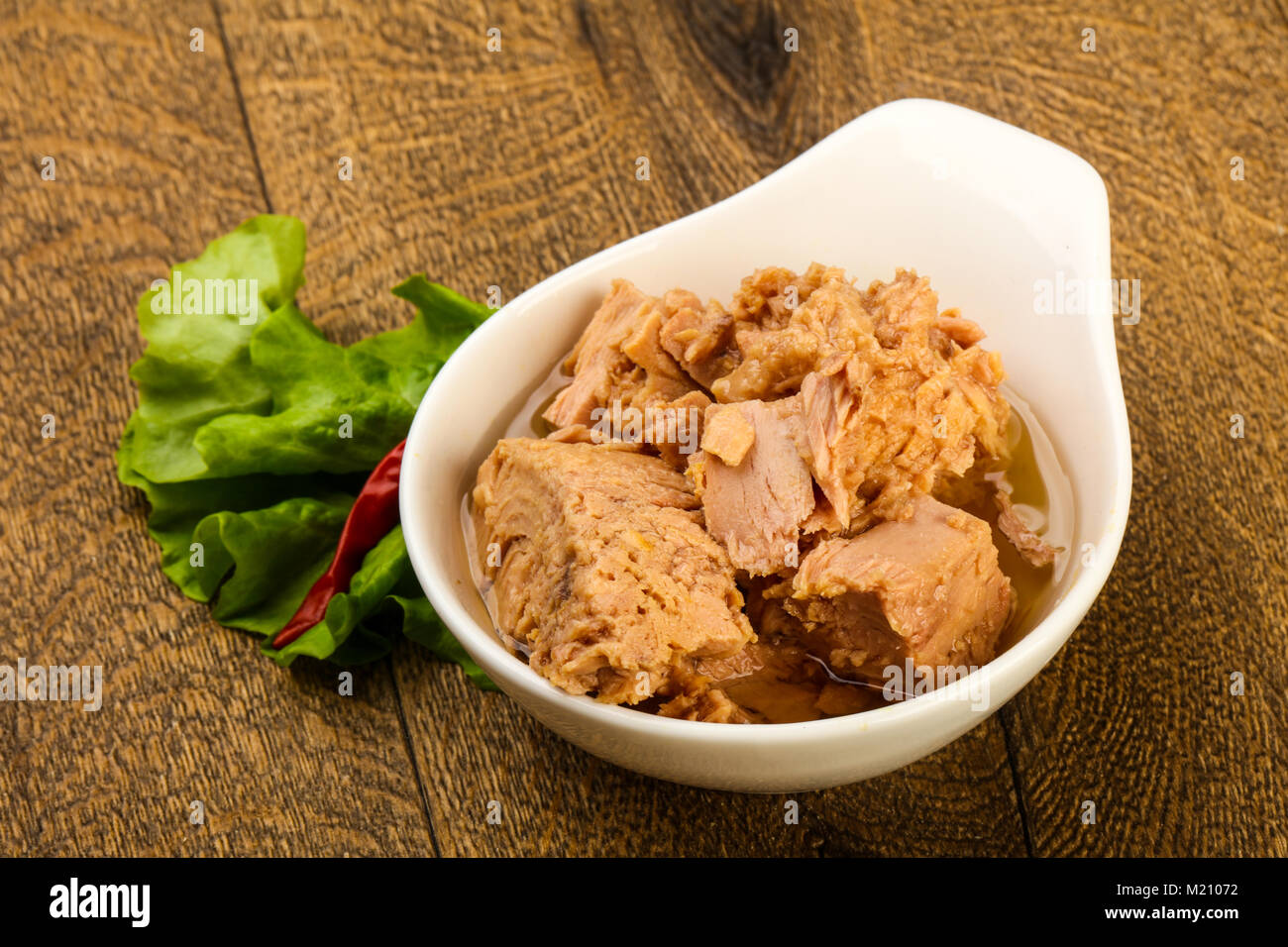 Canned tuna fish in the bowl ready for cooking Stock Photo - Alamy