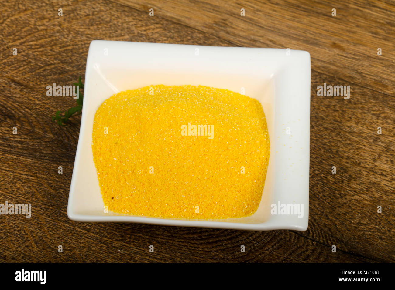 Raw polenta ready for cooking Stock Photo - Alamy