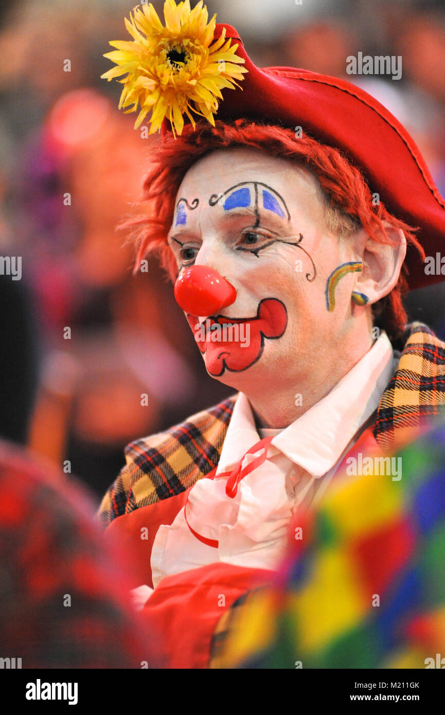 A clown wearing a sunflower during the 67th Annual Grimaldi Clown ...