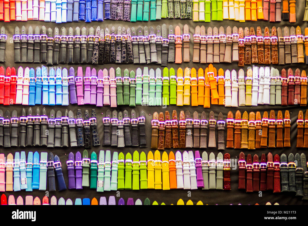 Abstract photograph of a display of watch straps in a market Stock ...