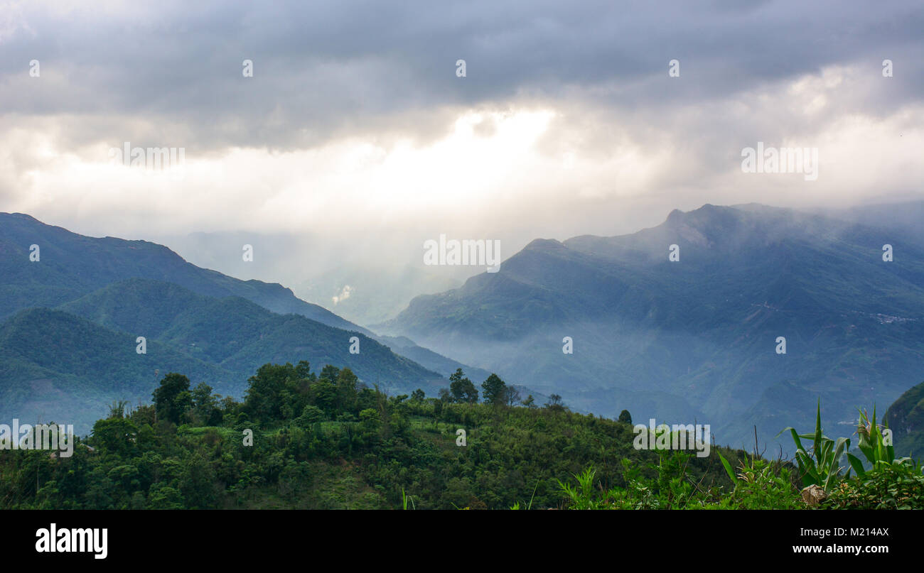 Sunset on mountains in Sapa Township, North of Vietnam Stock Photo - Alamy