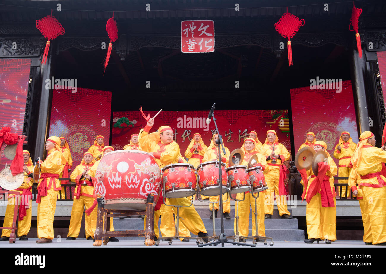 Shengzhou, China, 3rd Feb, 2018. Actors perform for villagers during a ...