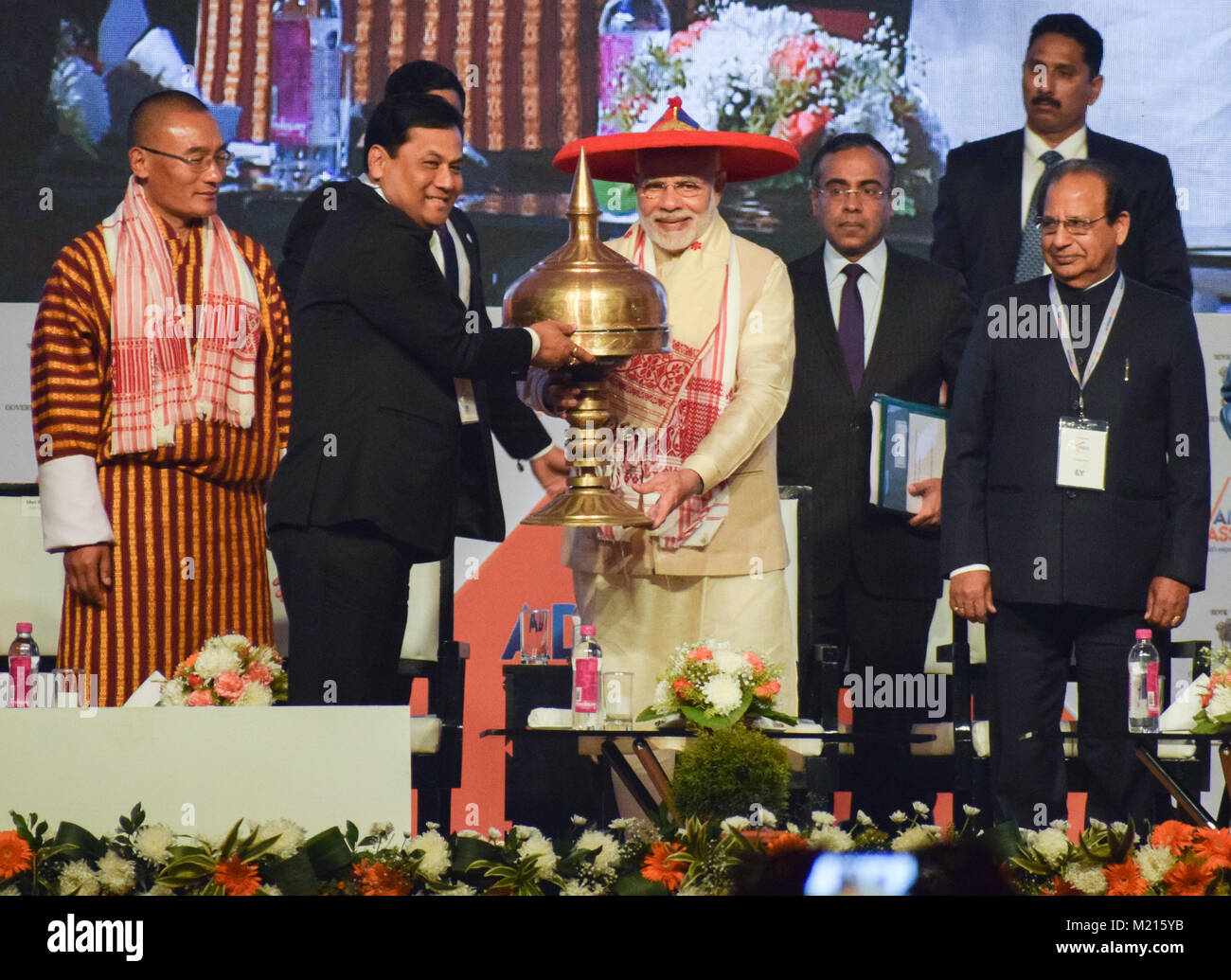 Prime Minister of India Narendra Modi being felicitated by Assam Chief ...