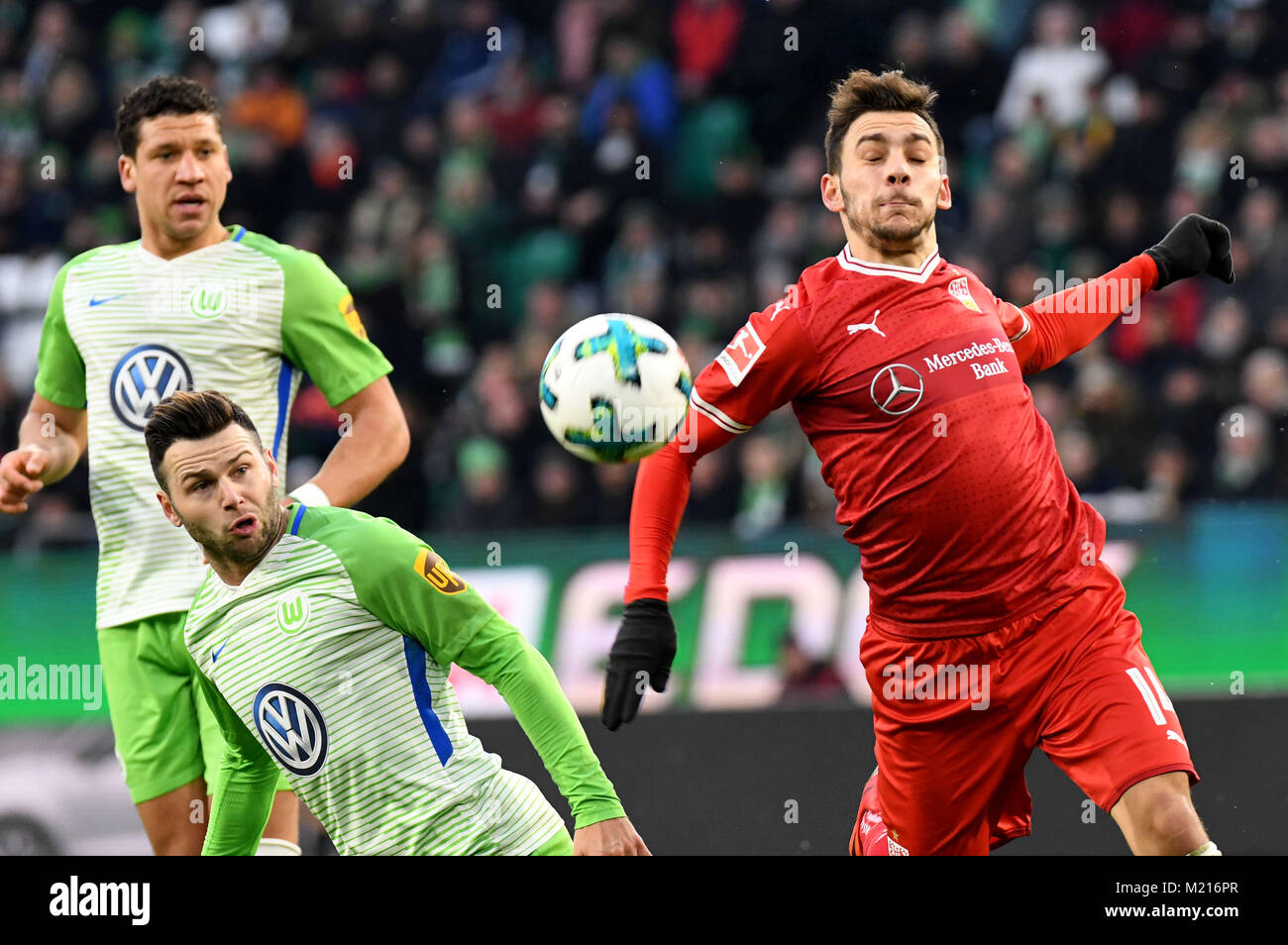 Wolfsburg, Germany. 3rd Feb, 2018. Wolfsburg's Renato Steffen (l) and Stuttgart's Anastasios ...