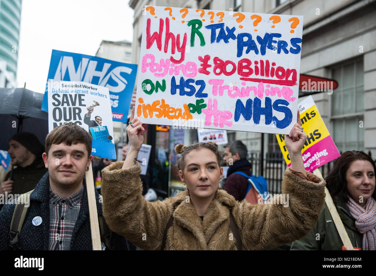 London, UK. 3rd February, 2018. Supporters of the NHS take part in an ...