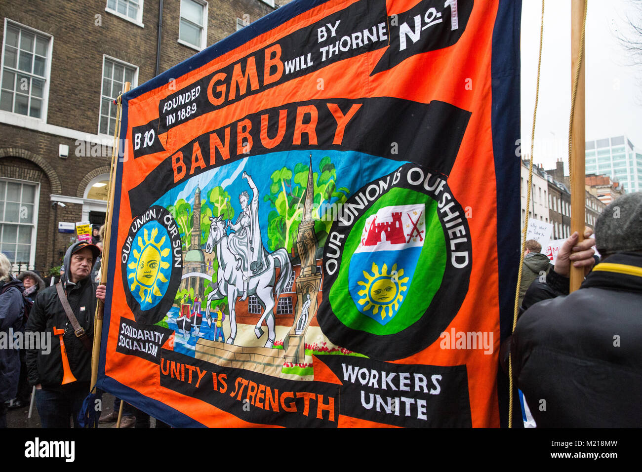 London, UK. 3rd February, 2018. A GMB trade union banner held by ...