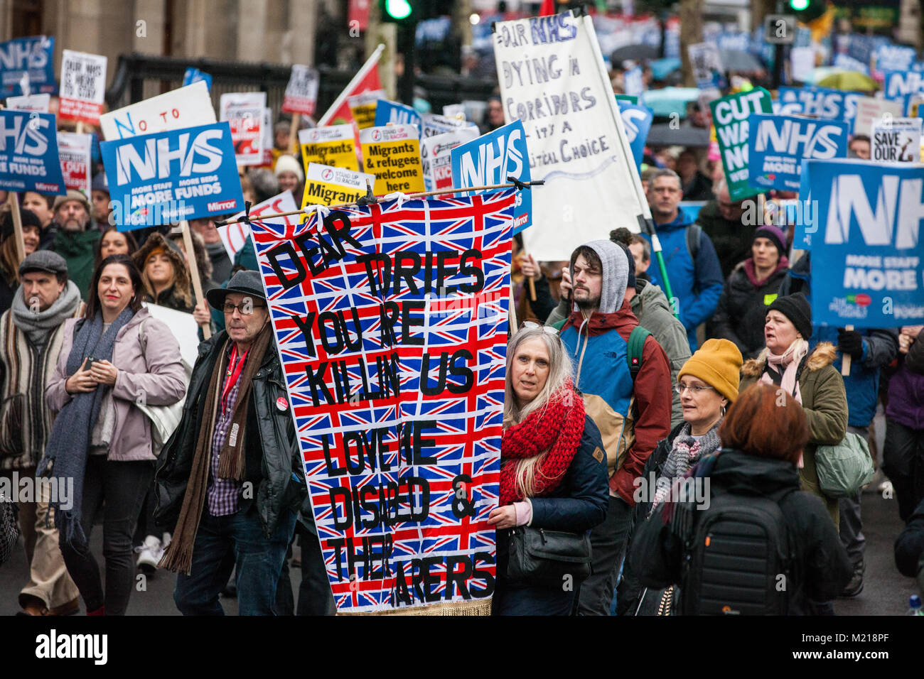 London, UK. 3rd February, 2018. Supporters of the NHS take part in an ...