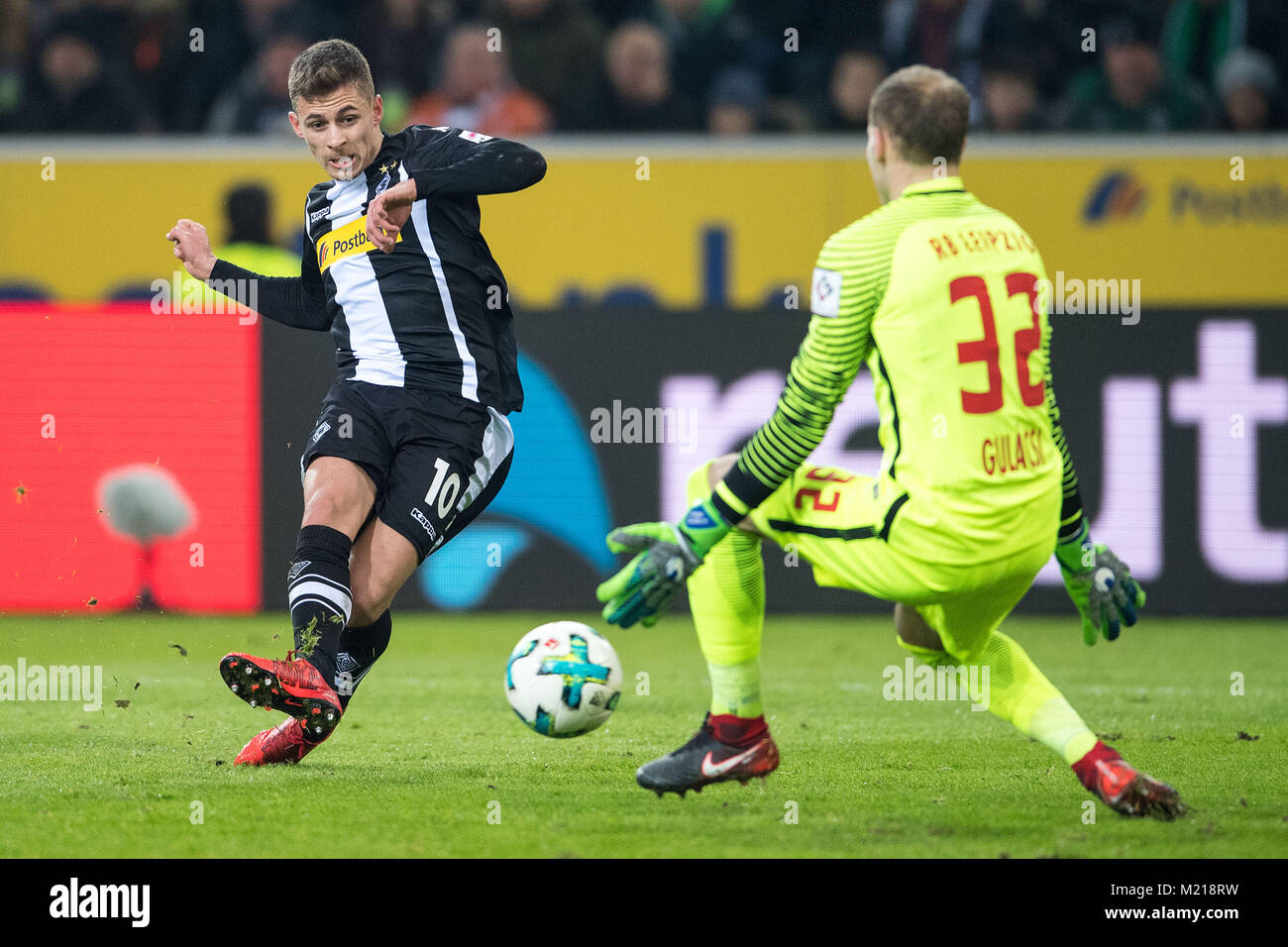 Gladbach's Thorgan Hazard (l) is offside against Leipzig goalie Peter ...