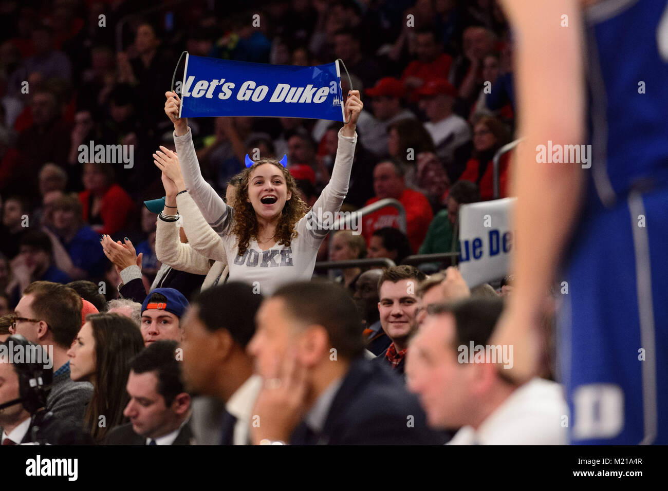 February 03, 2018: A Duke Blue Devils fan looks over at the bench and ...