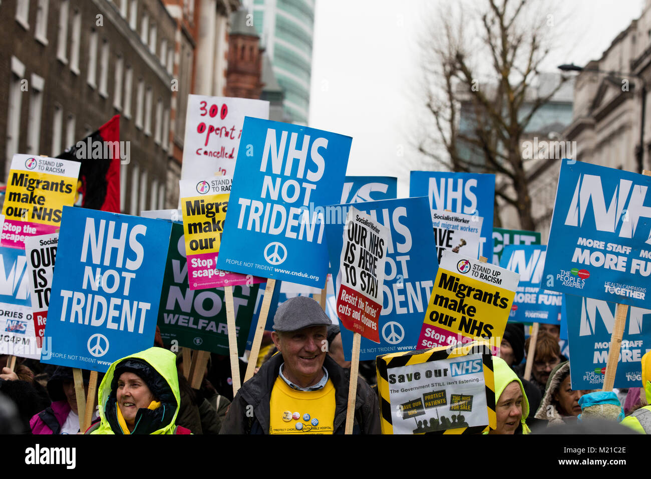 Protesters and campaigners on a save the NHS march in central London ...