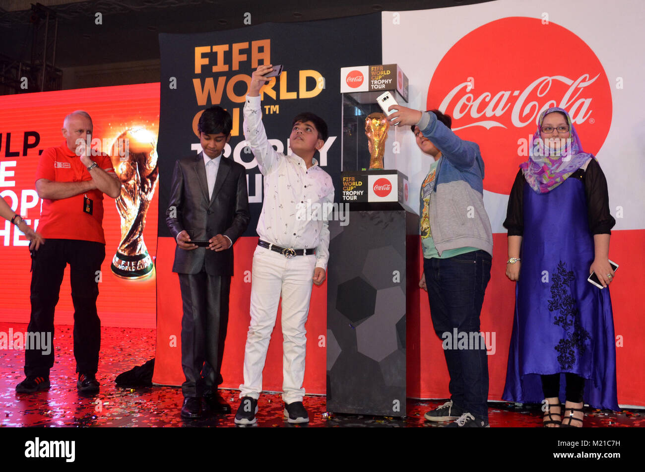 Lahore. 3rd Feb, 2018. People take selfies with the FIFA World Cup ...