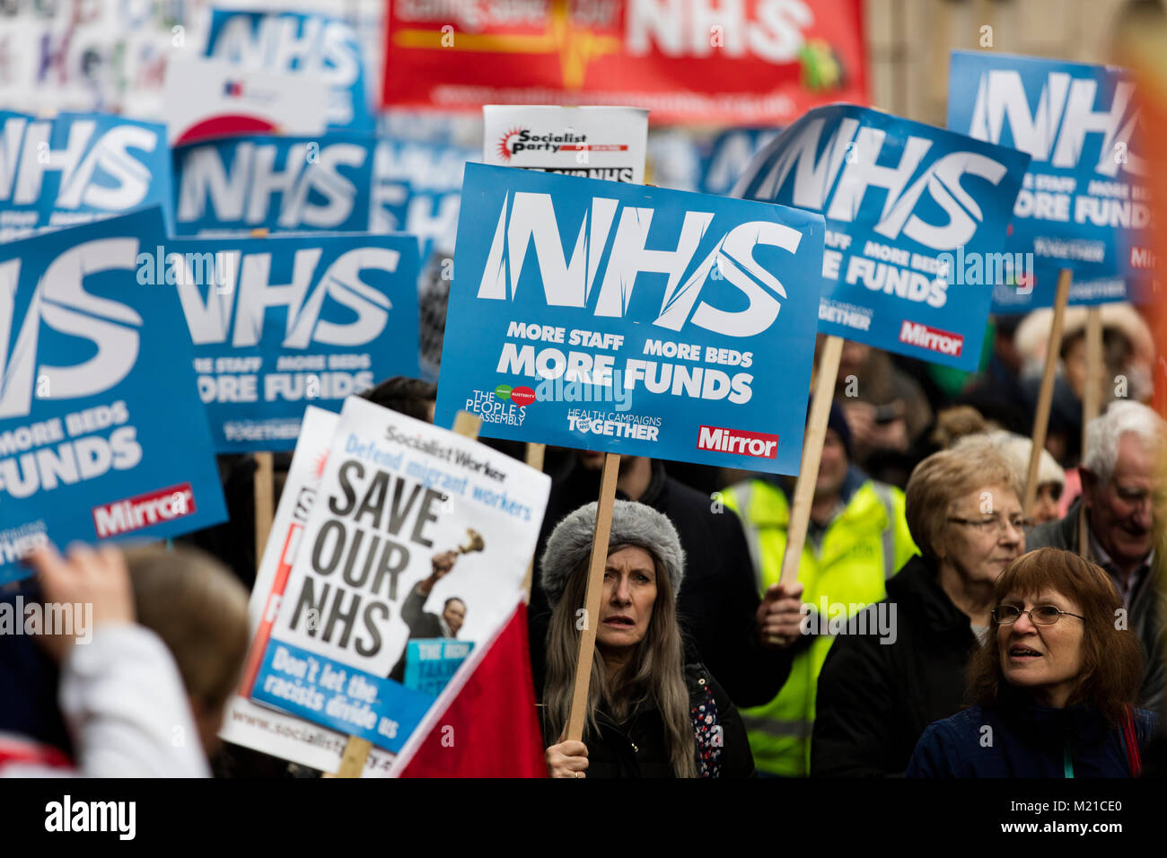 Protesters and campaigners on a save the NHS march in central London ...