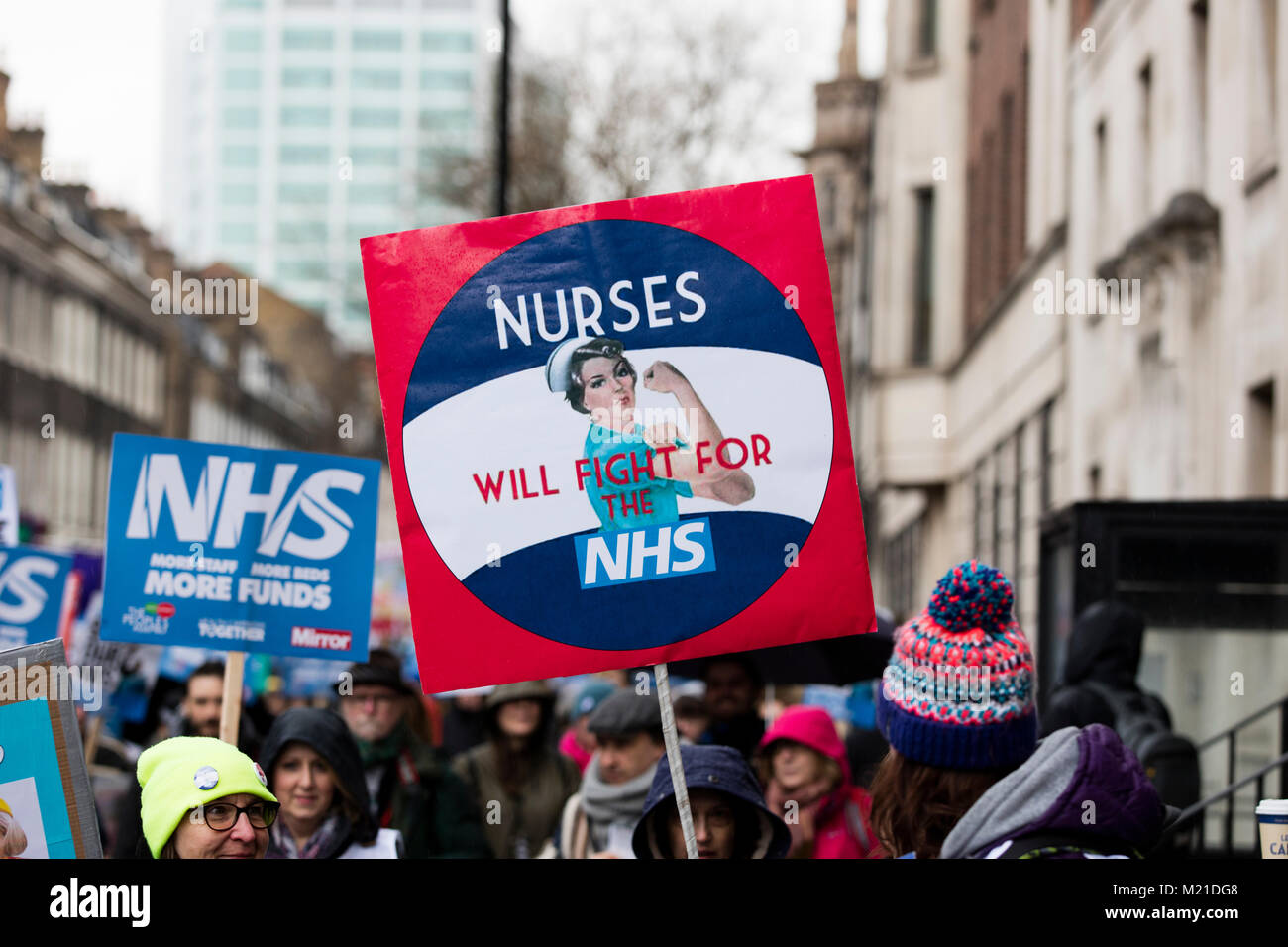Protesters and campaigners on a save the NHS march in central London ...