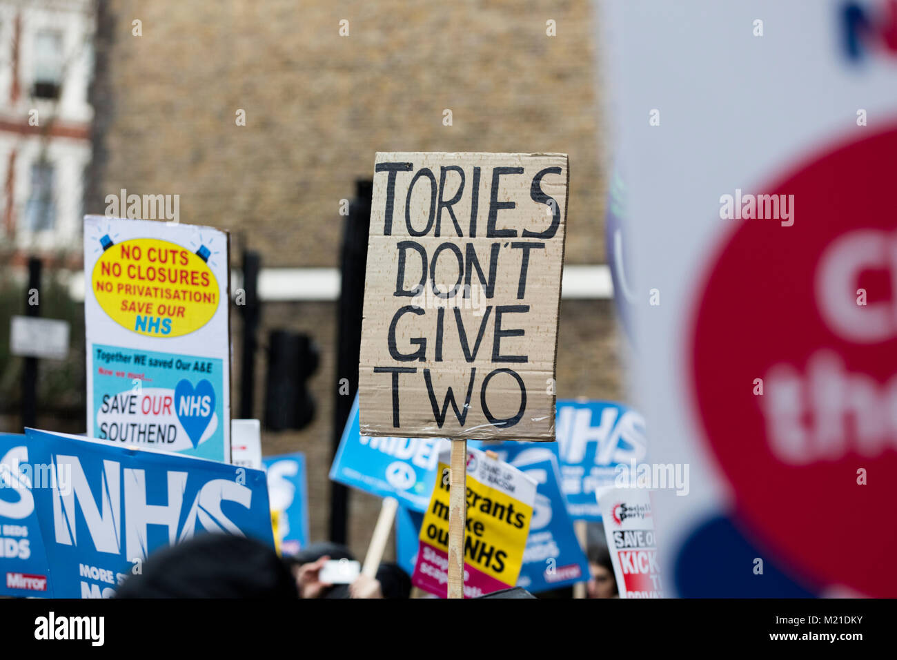 Protesters and campaigners on a save the NHS march in central London ...