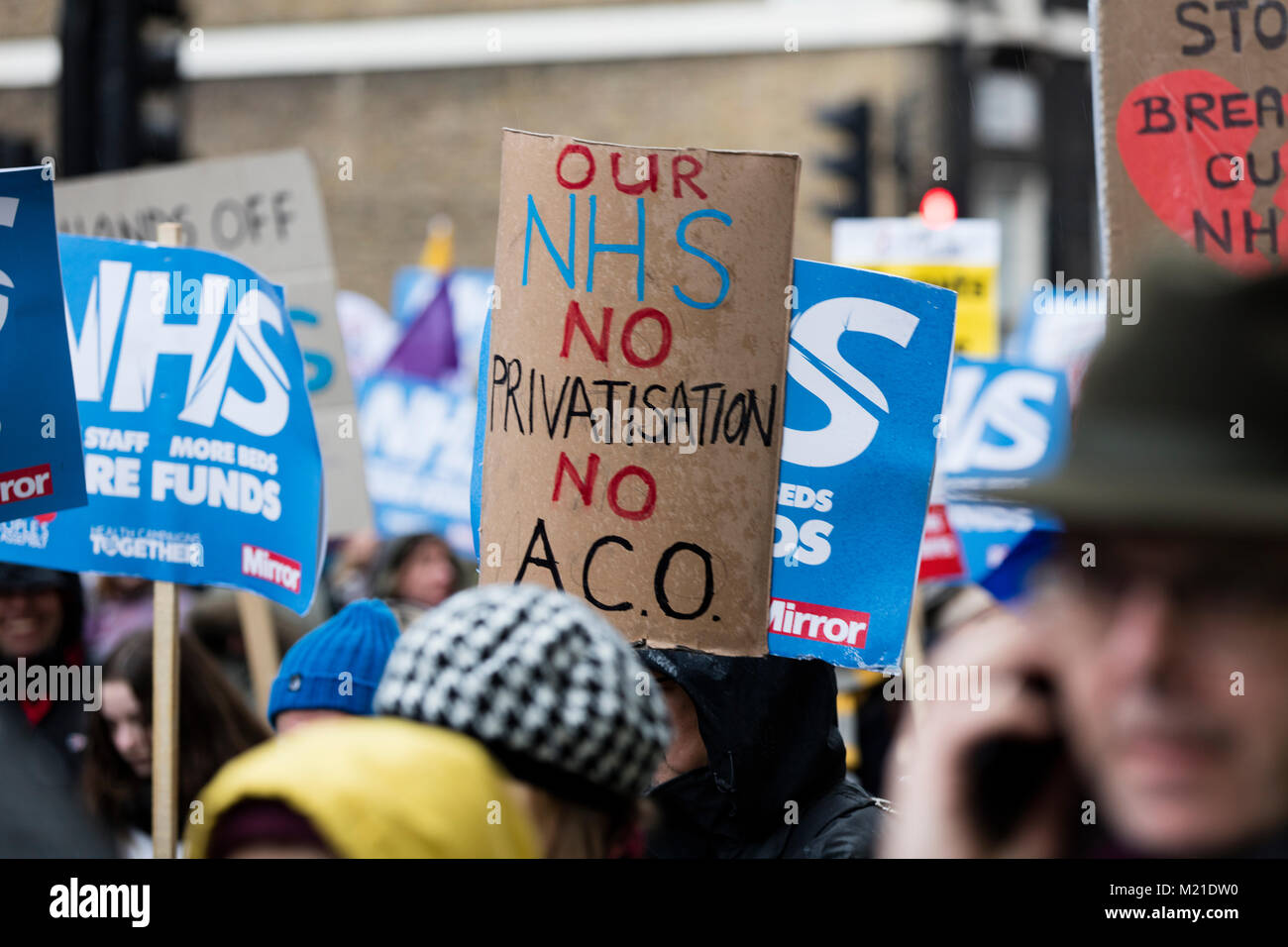 Protesters and campaigners on a save the NHS march in central London ...