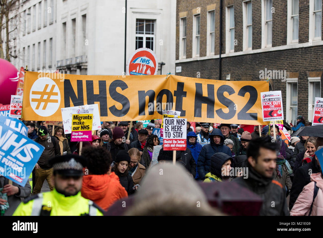 Protesters and campaigners on a save the NHS march in central London ...