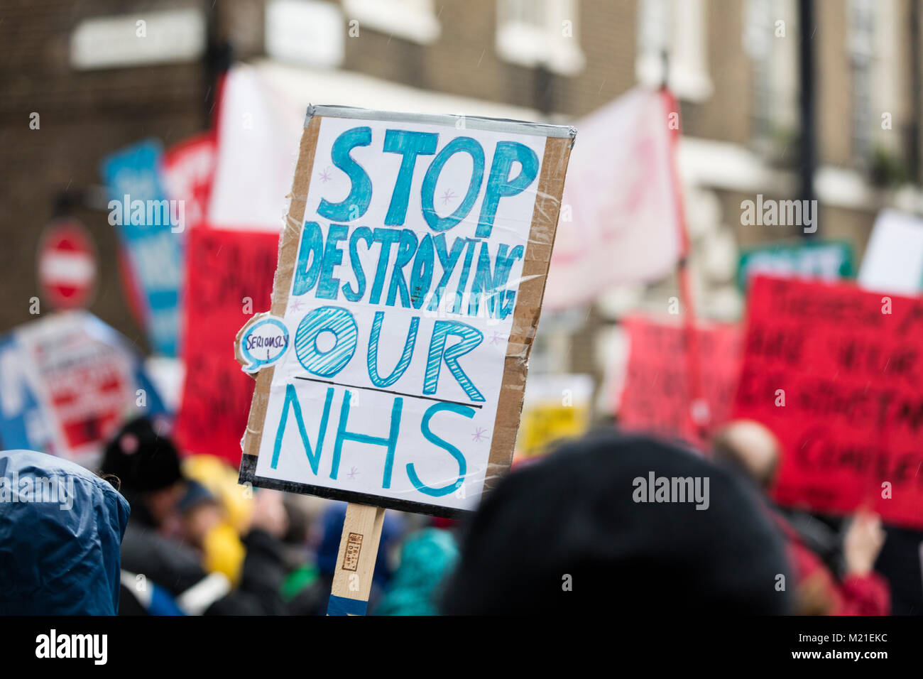 Protesters and campaigners on a save the NHS march in central London ...