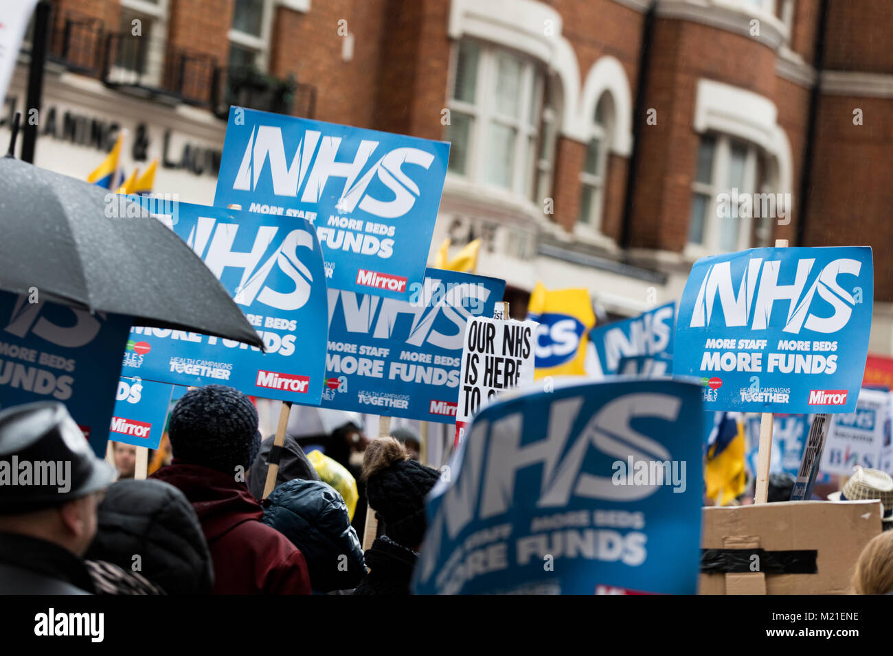 Protesters and campaigners on a save the NHS march in central London ...