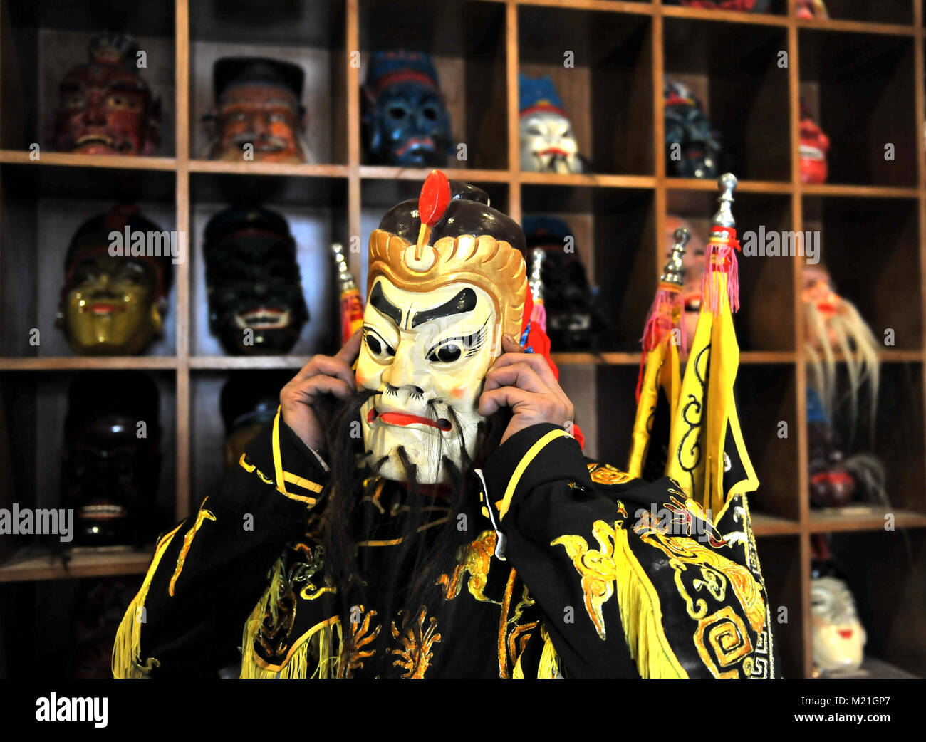 Qiannan, China's Guizhou Province. 3rd Feb, 2018. A villager prepares ...