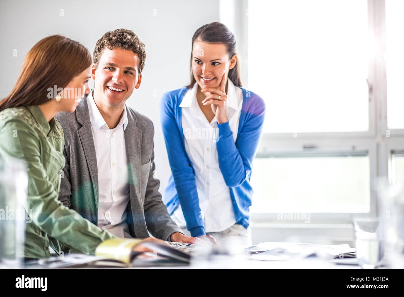 Business people discussing in office Stock Photo - Alamy
