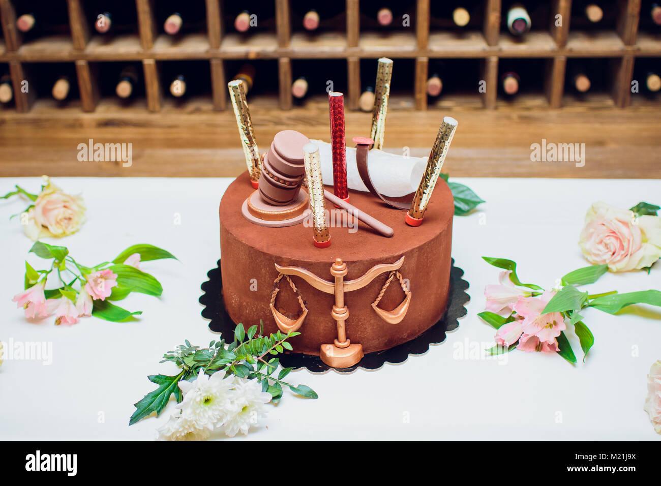 Bride and groom cake topper couple with legal gavel Stock Photo - Alamy