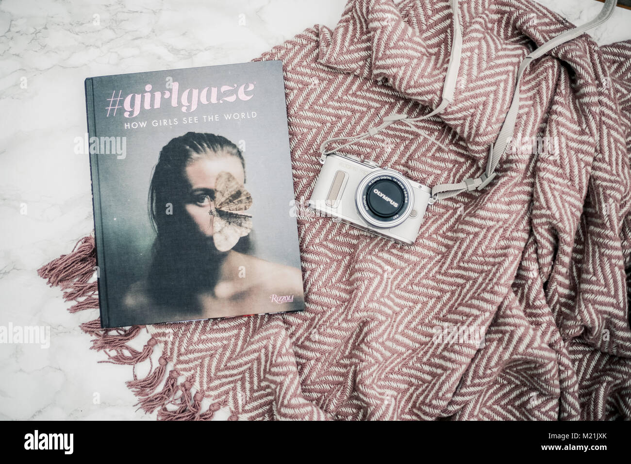 Inspirational book flat lay with pink blanket Stock Photo - Alamy