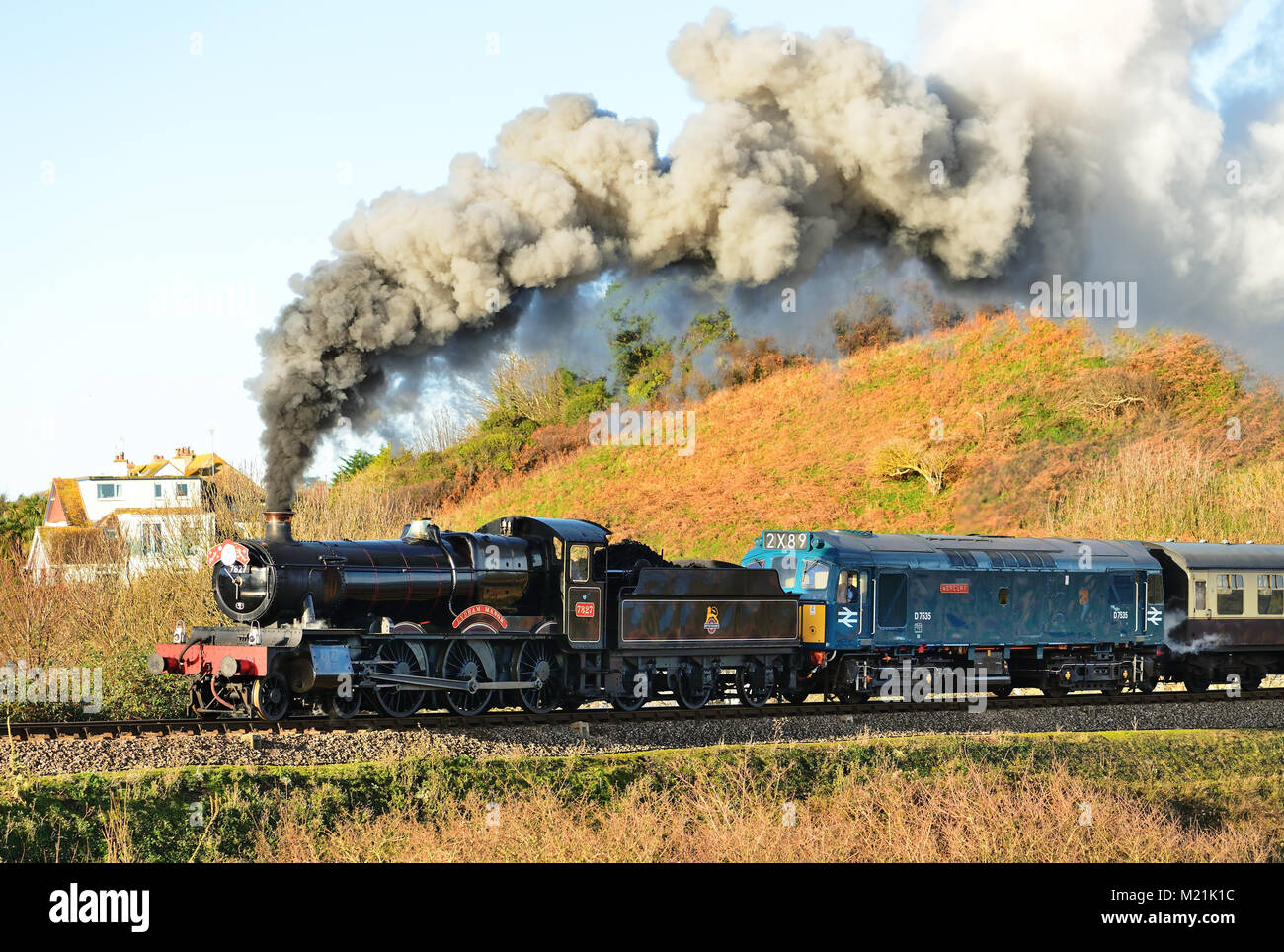 GWR loco No 7827 'Lydham Manor' is assisted by class 25 diesel No D7535 ...
