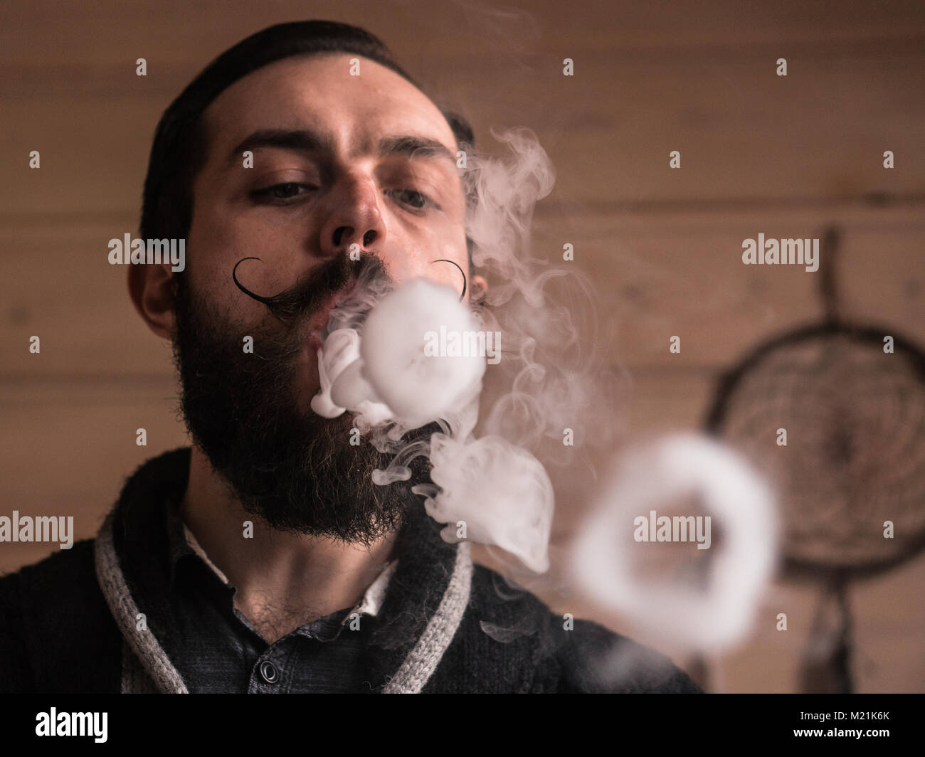 Man with Beard and Mustages Vaping an Electronic Cigarette. Vaper ...