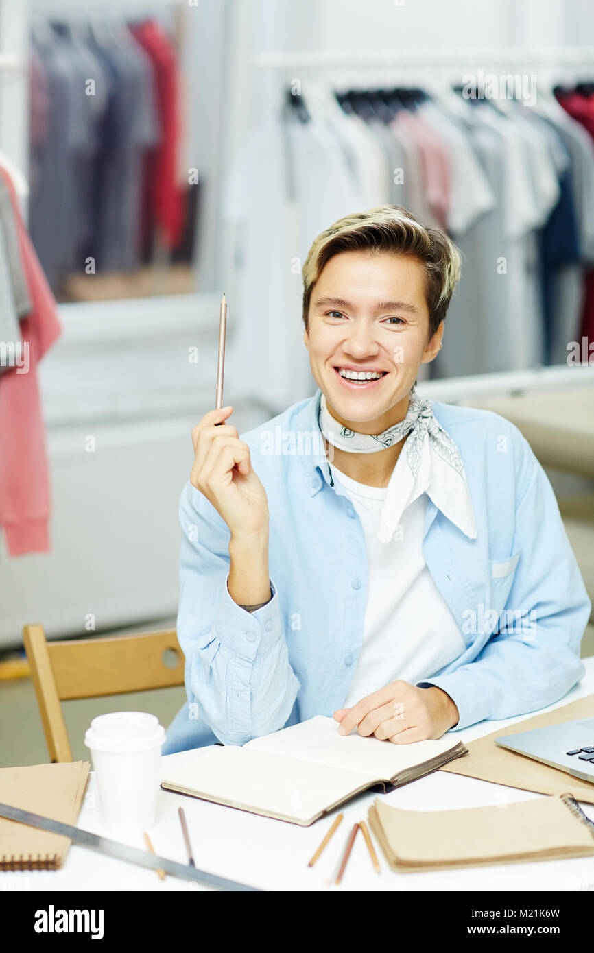 Designer with pencil Stock Photo - Alamy