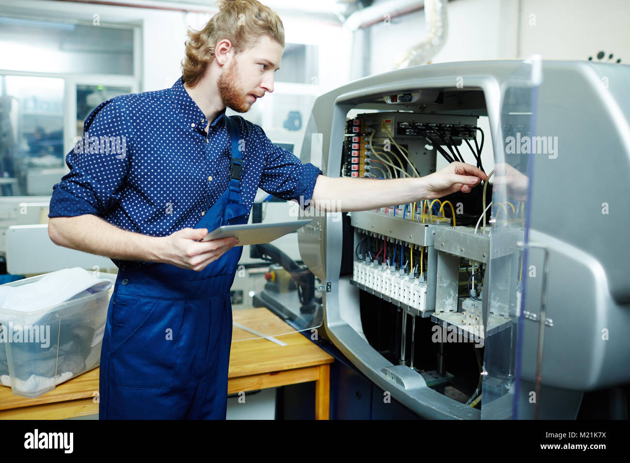 Checking printing machine Stock Photo - Alamy