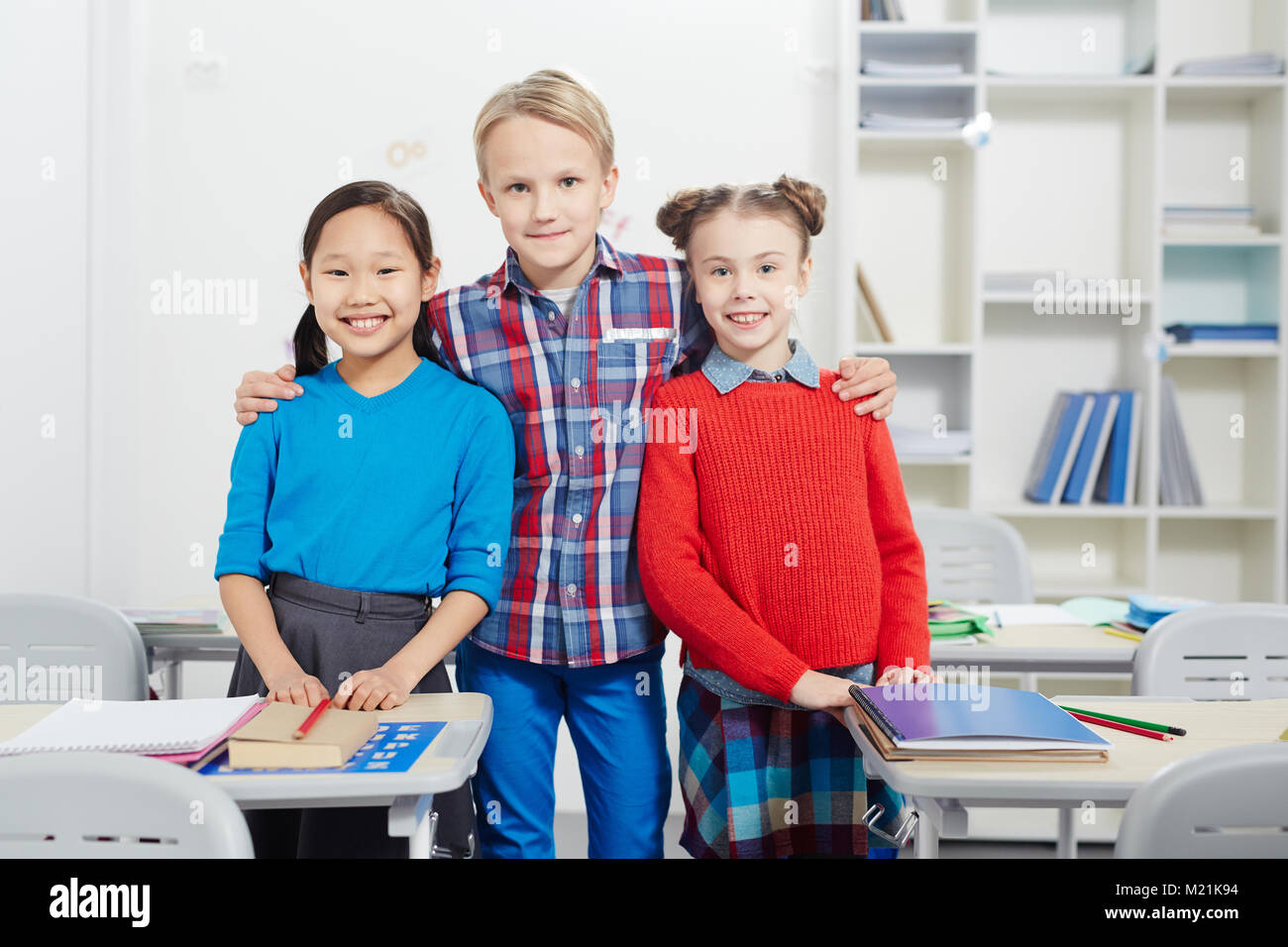 Boy girl school embracing hi-res stock photography and images - Alamy