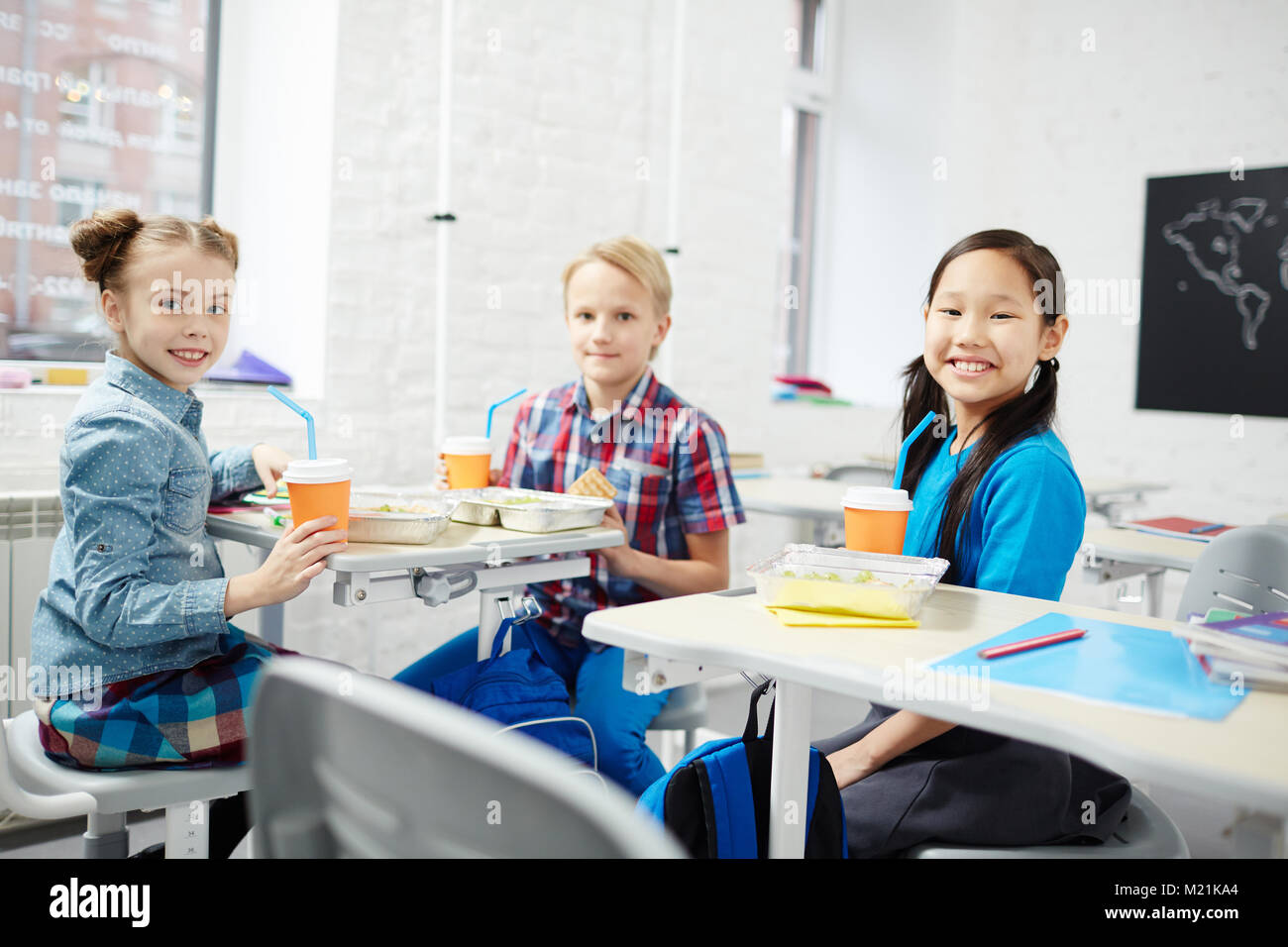 Eating at break Stock Photo - Alamy