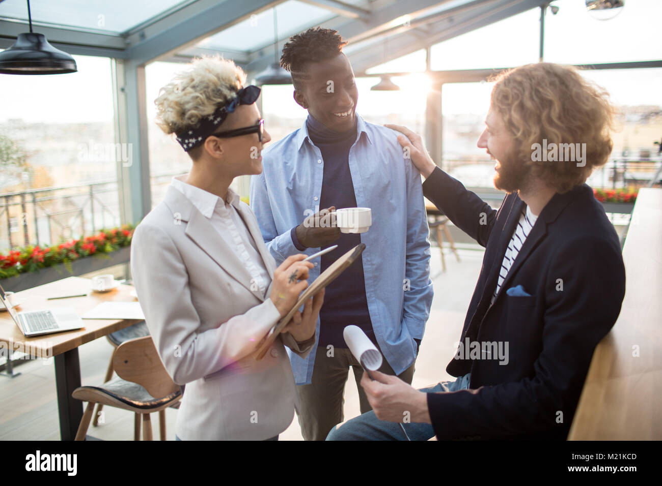 Laughing at break Stock Photo - Alamy