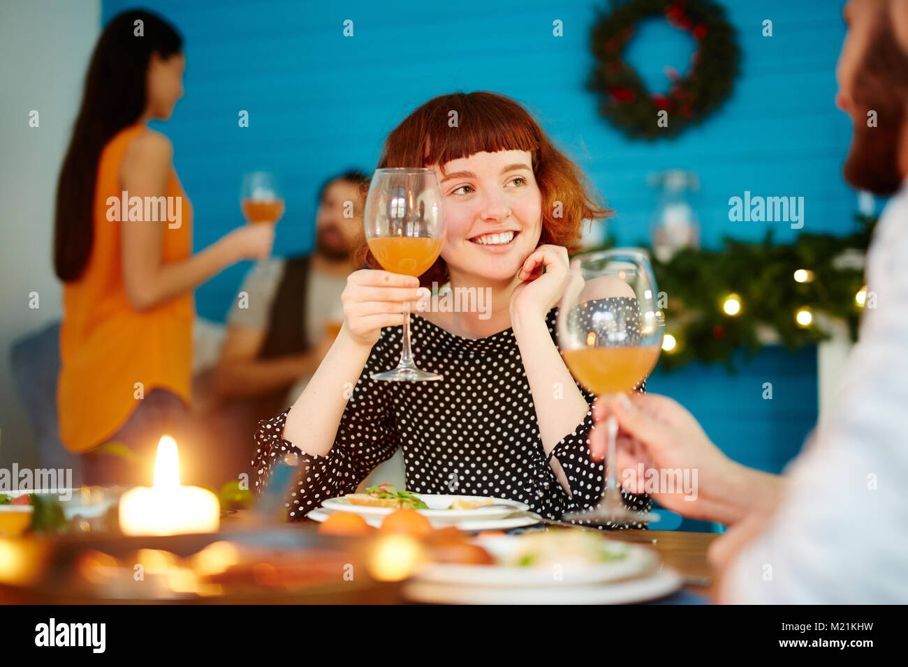 Toasting with juice Stock Photo - Alamy