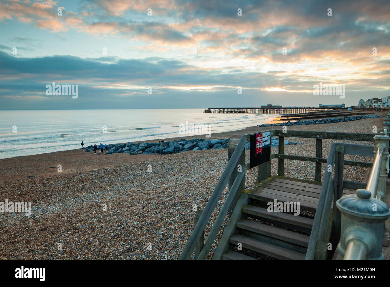 Sunset on Hastings beach, East Sussex, England Stock Photo - Alamy